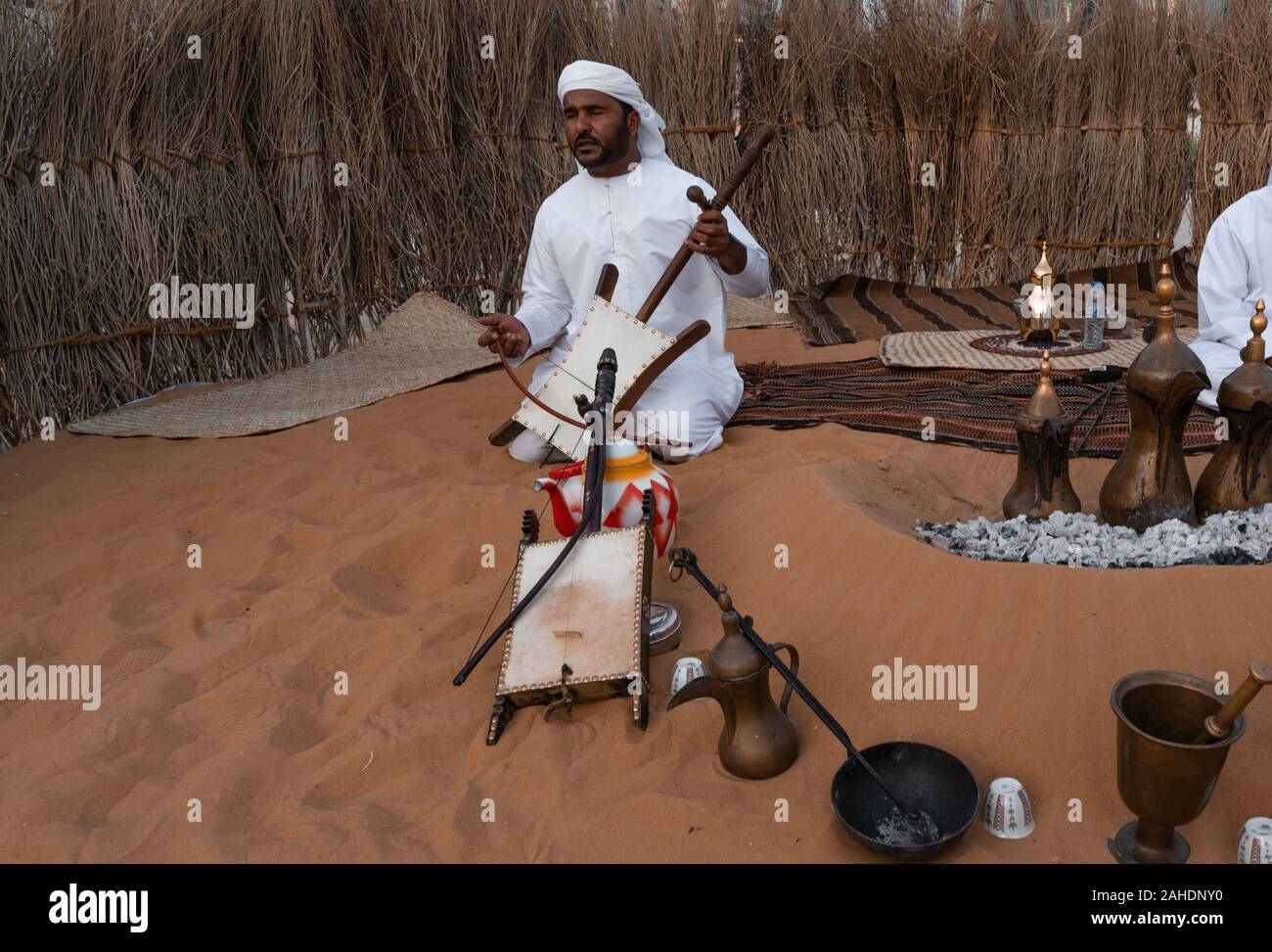 A Middle Eastern man singing and playing music | Arabic culture display ...