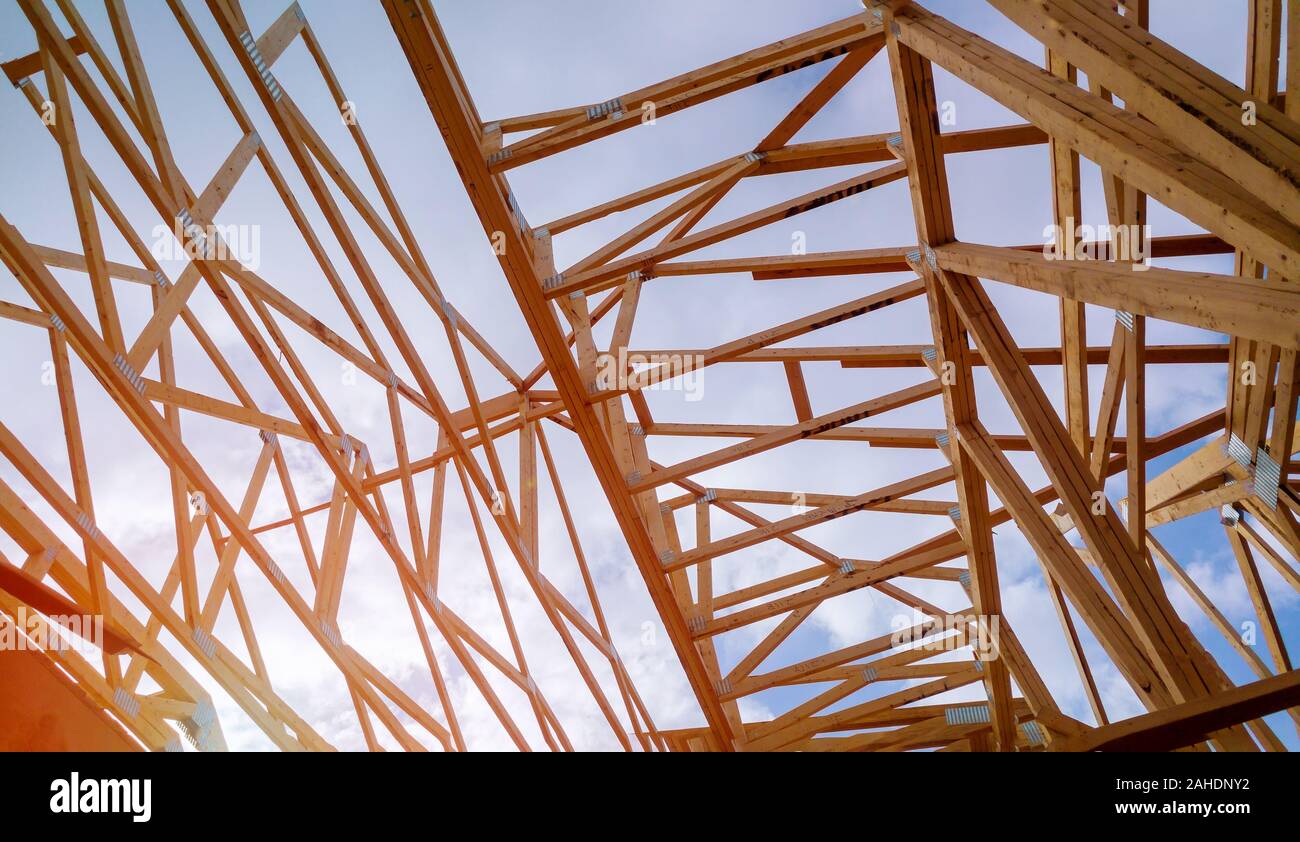 Framing of a new house under construction frame stick Stock Photo - Alamy