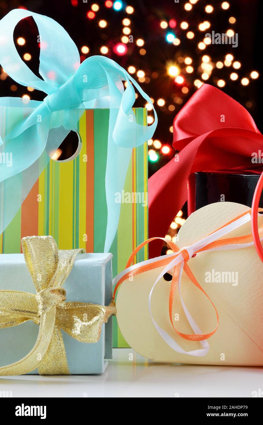 Presents on sparkling lights background Stock Photo - Alamy