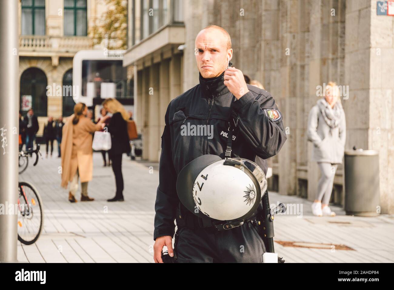 German police officer. Riot Police Germany. Police patrolling in ...