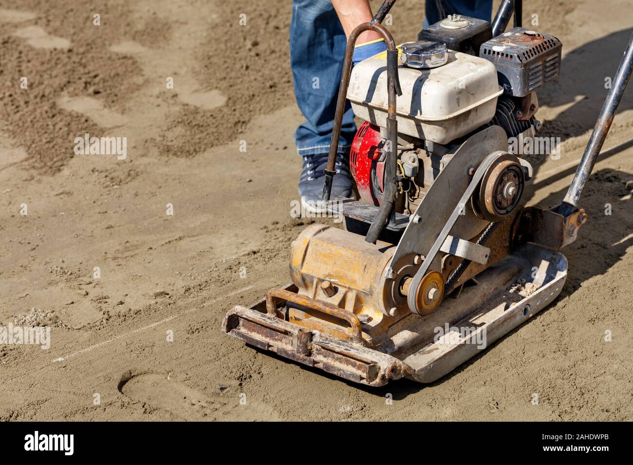 Hand compactor hi-res stock photography and images - Alamy