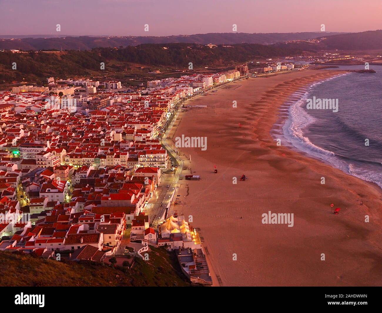 Aerial view of Nazare at the Centro coast of Portugal with long beach ...