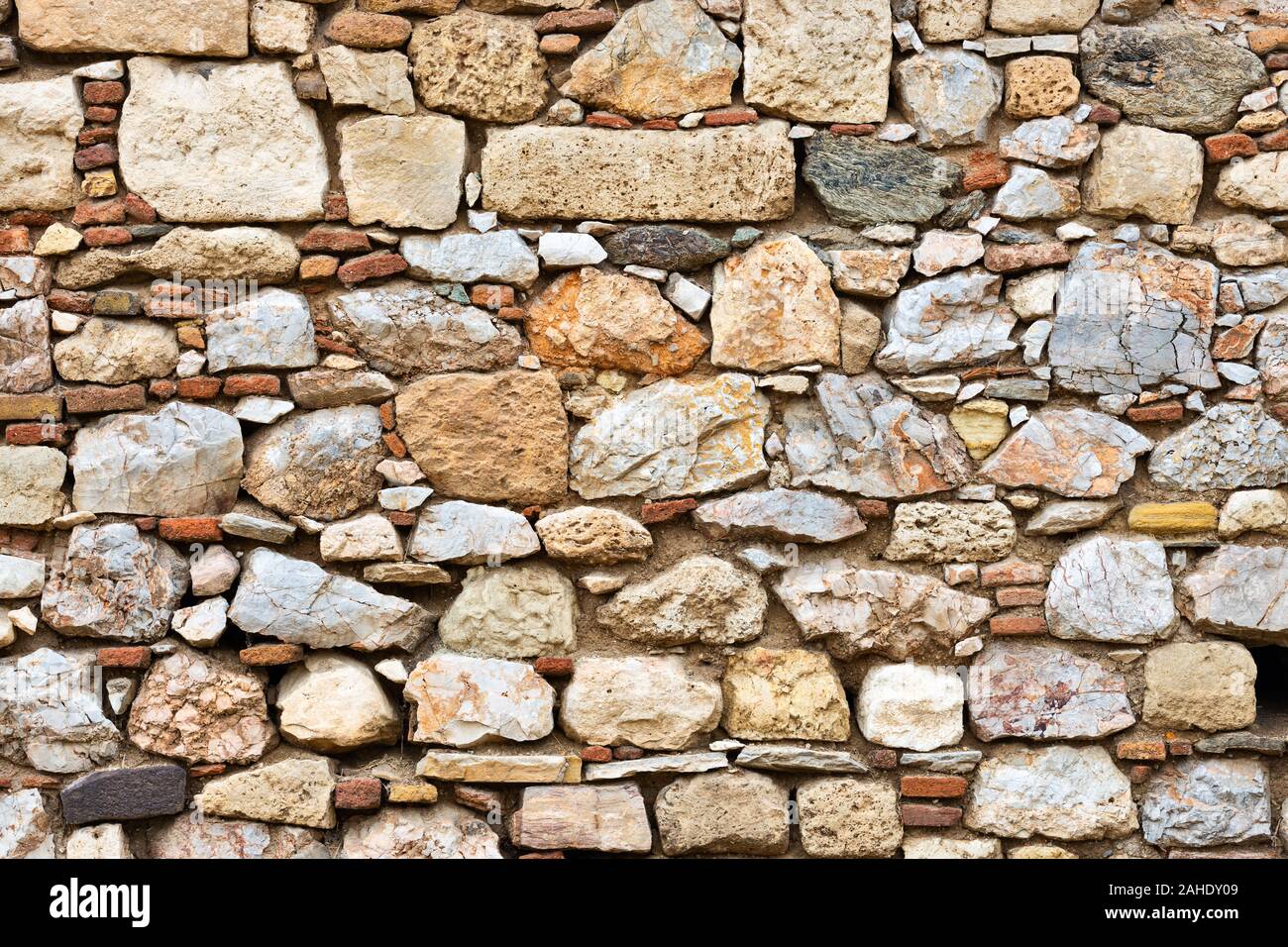 Ancient stone wall background from building exterior in Athens Greece ...