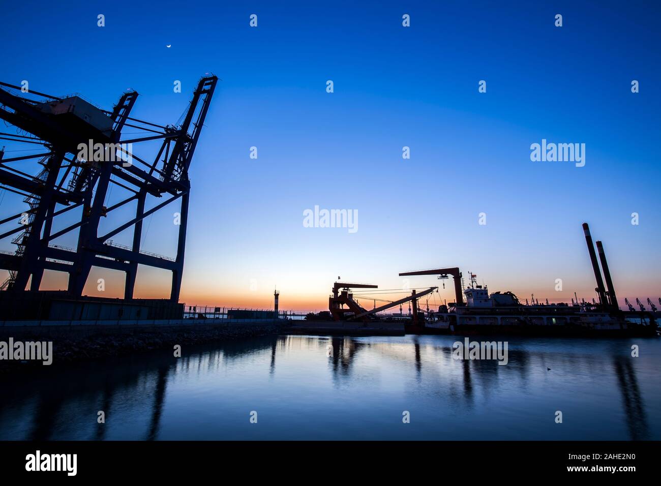 Container terminal in the evening Stock Photo - Alamy