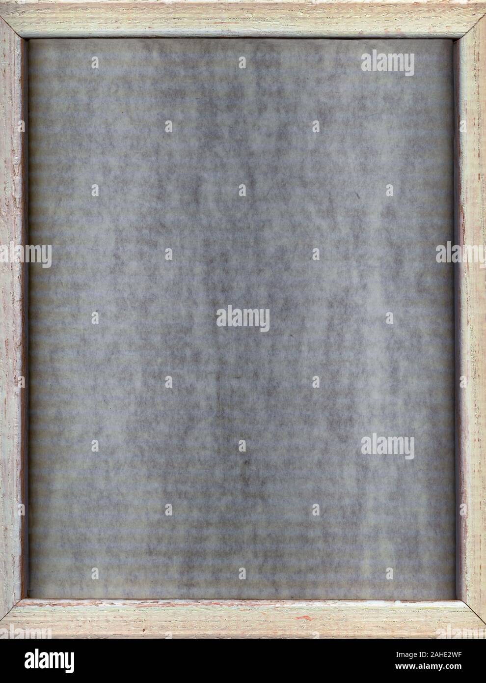 Blank and empty old picture frame with a cardboard insert. This is a ...