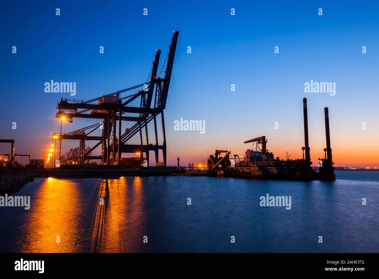 Container terminal in the evening Stock Photo - Alamy