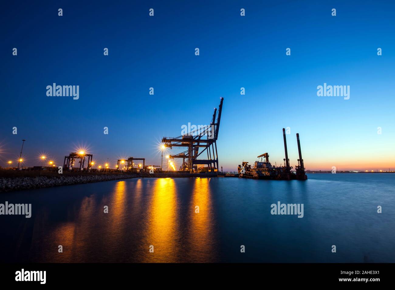 Container terminal in the evening Stock Photo - Alamy