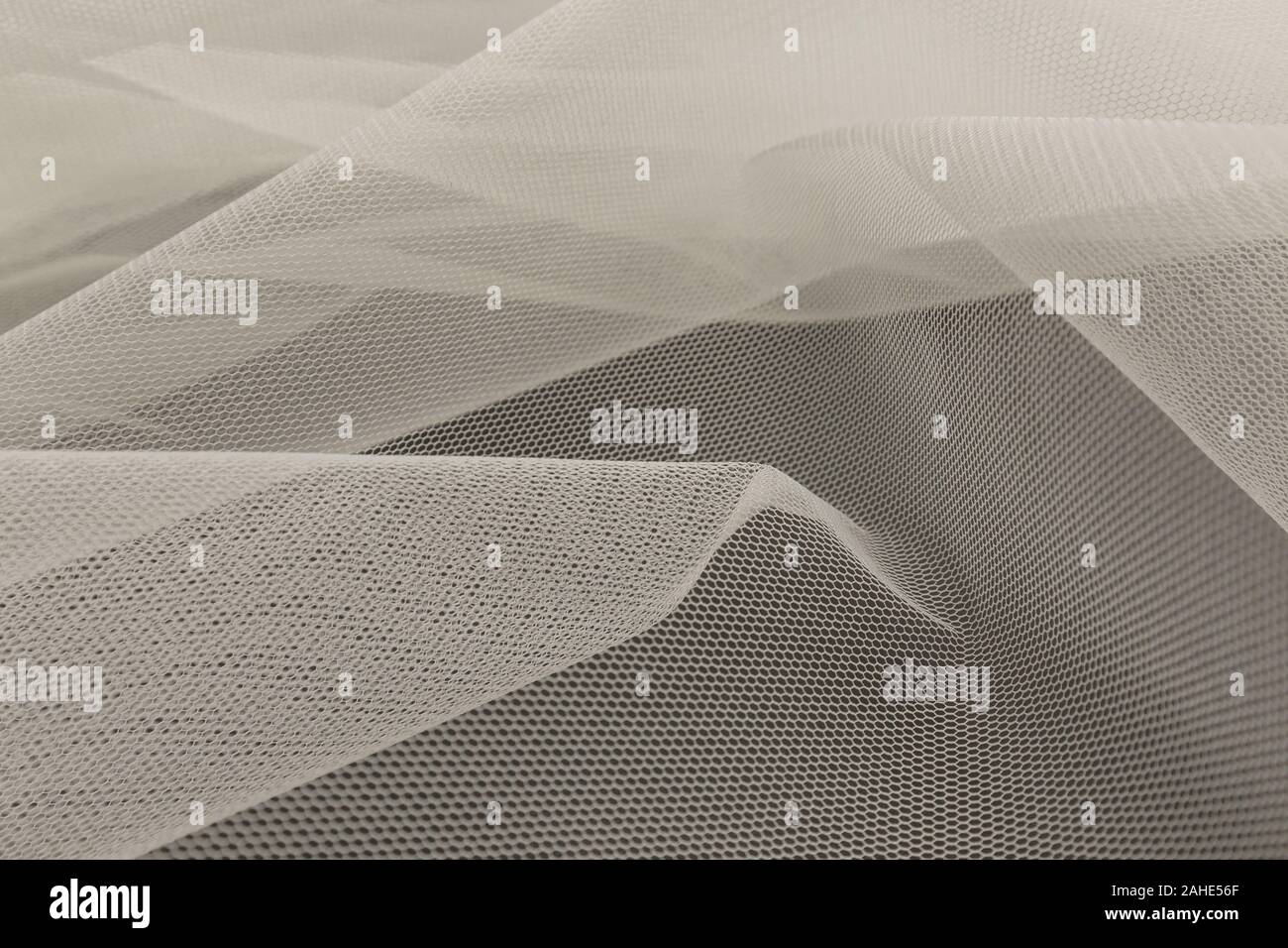 Beautiful close up of white tulle fabric with textile texture ...
