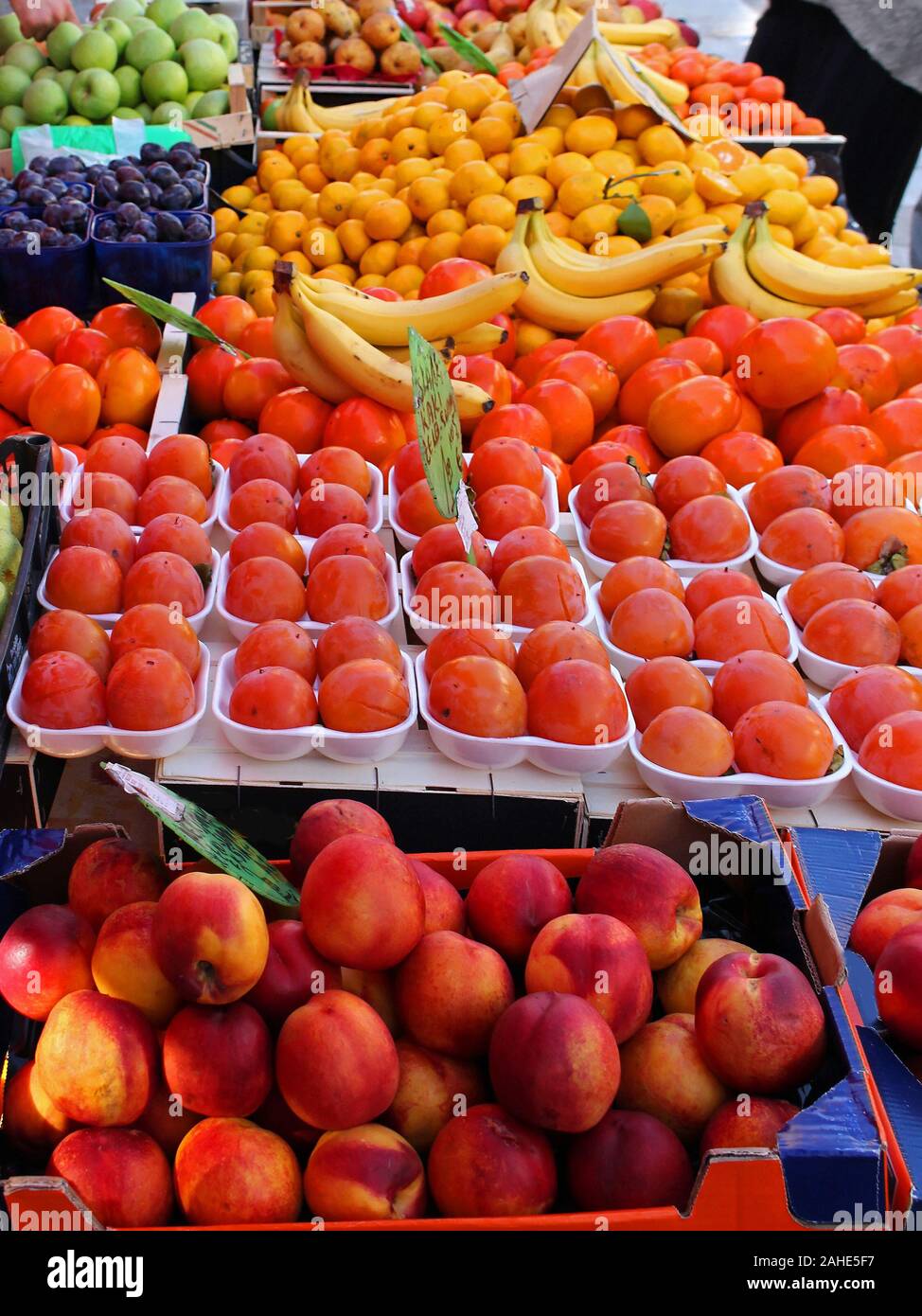 Fresh organic fruits piles sold on market Stock Photo - Alamy