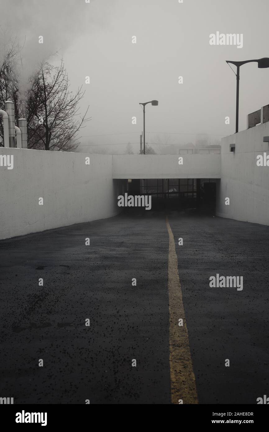 Misty top floor of a parking garage at Bank and Second, with chimney ...