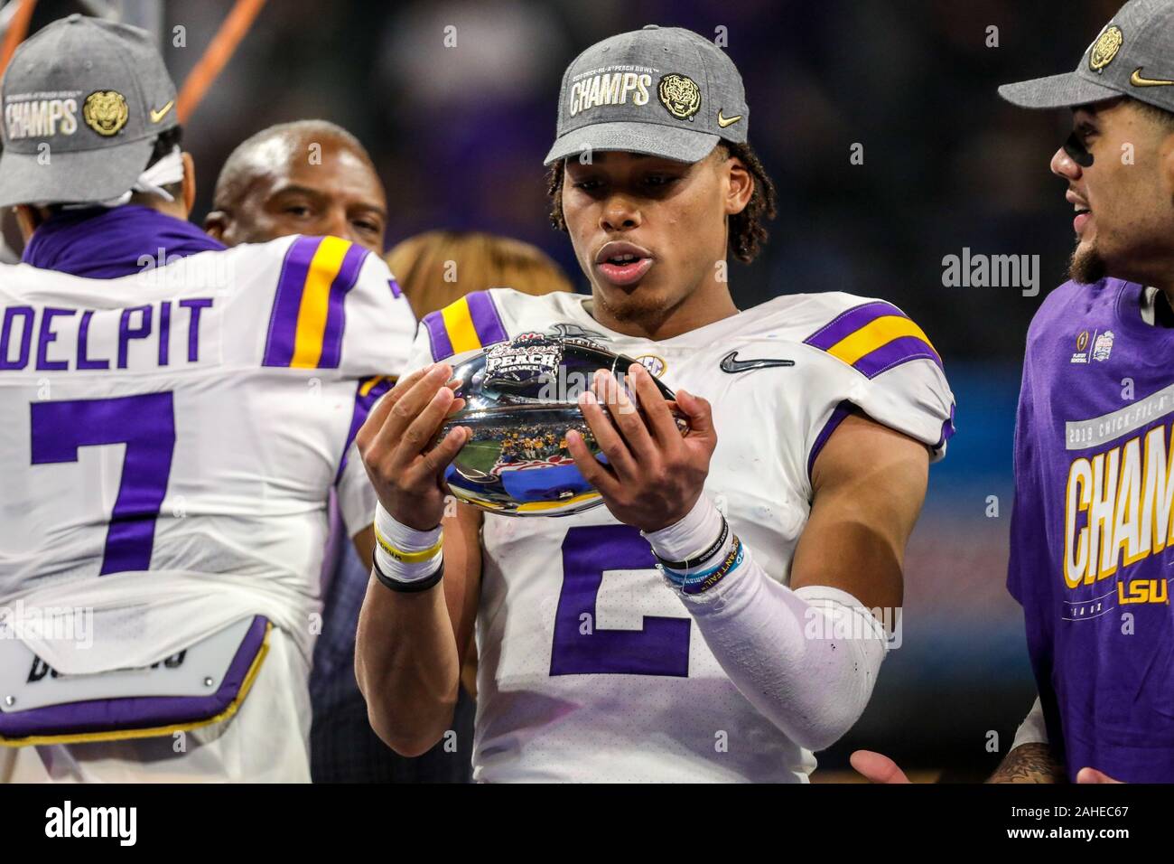 Atlanta, Georgia. 28th Dec, 2019. LSU's Justin Jefferson (2) hoists the ...