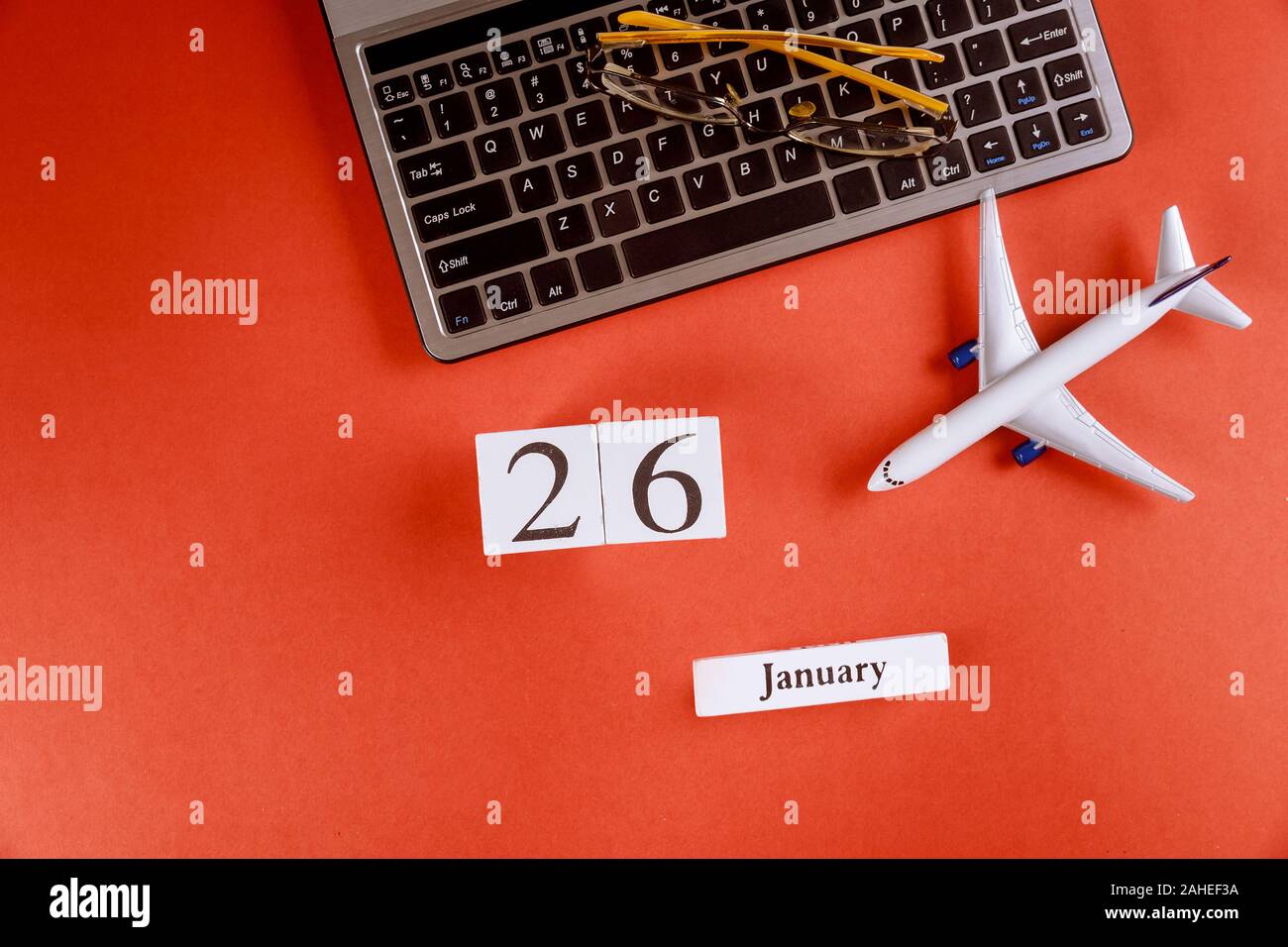 26 January calendar with accessories on business workspace office desk ...