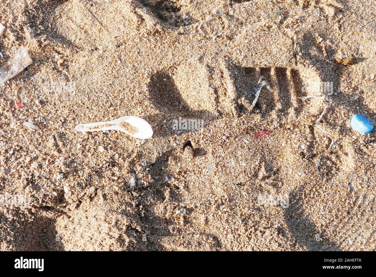 Trash on the beach Stock Photo - Alamy