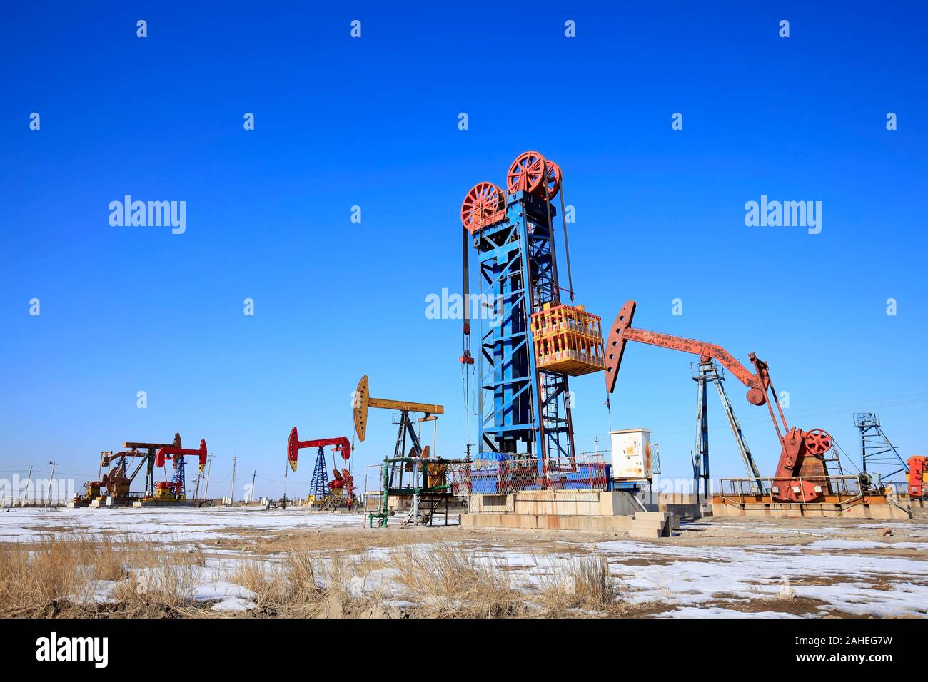 Oil fields, pumping units work Stock Photo - Alamy