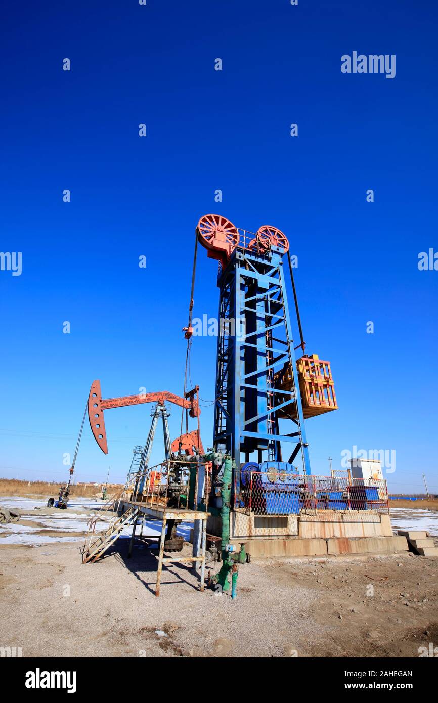 Oil fields, pumping units work Stock Photo - Alamy