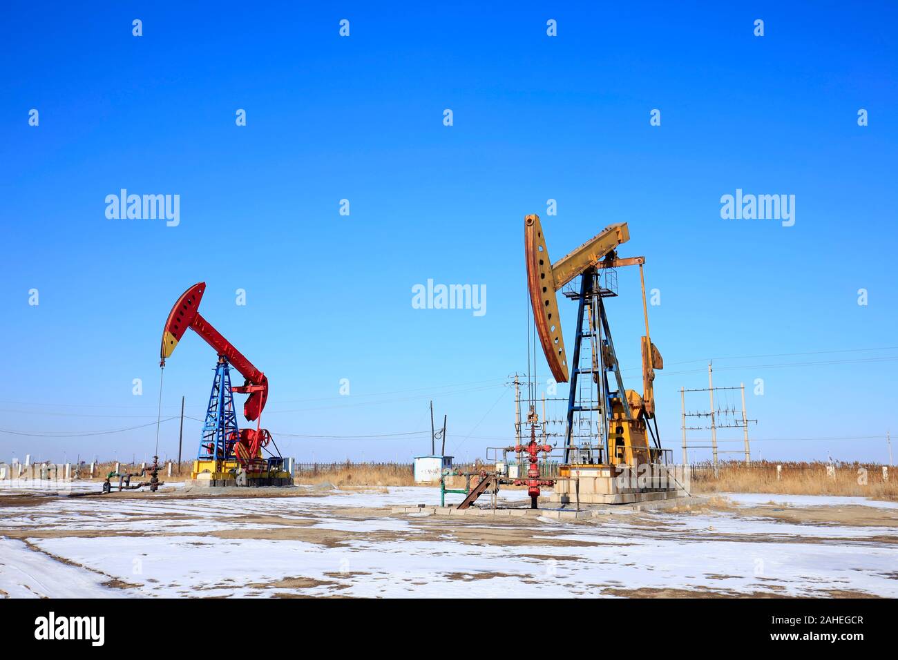 Oil fields, pumping units work Stock Photo - Alamy