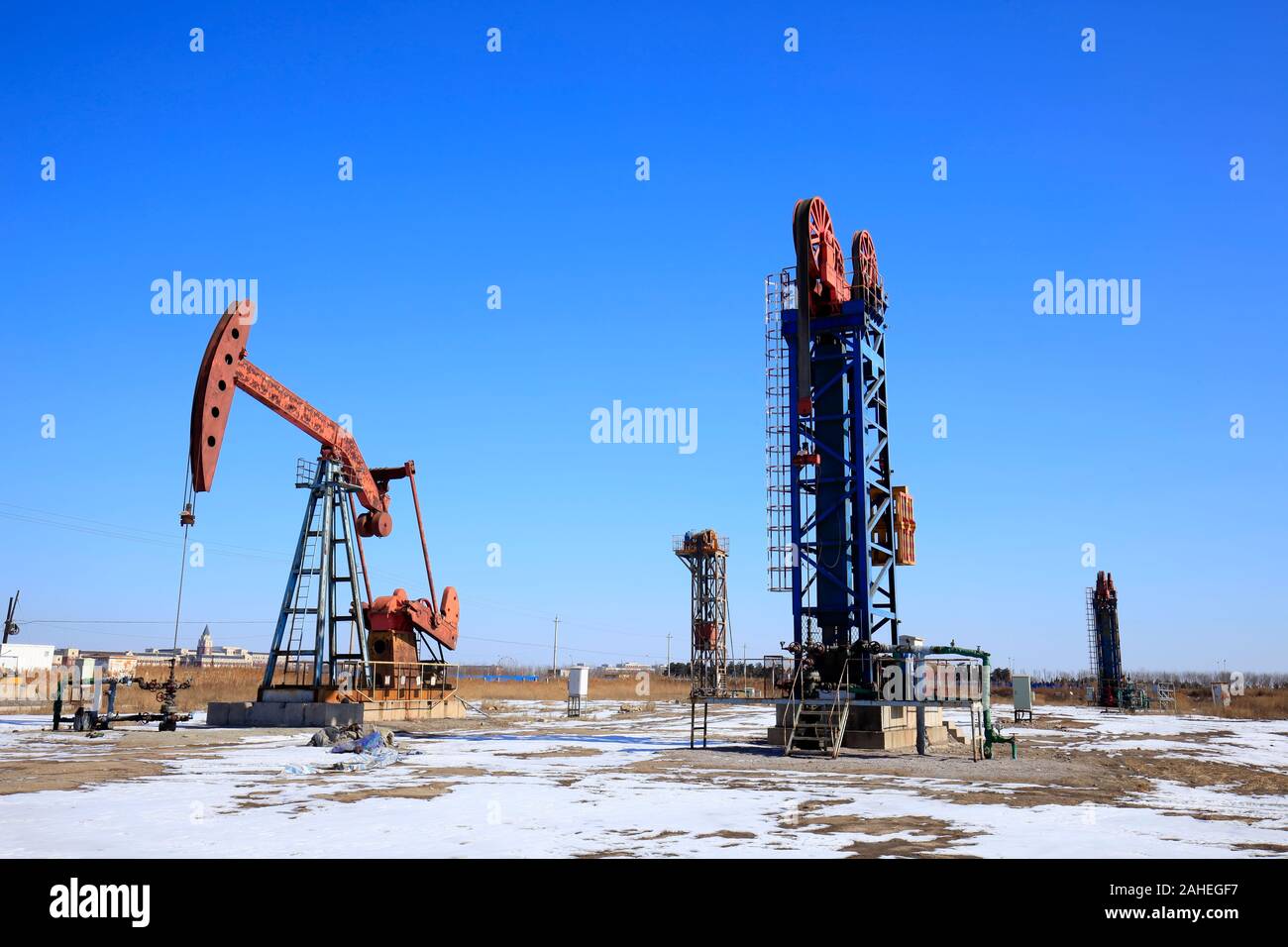 Oil fields, pumping units work Stock Photo - Alamy