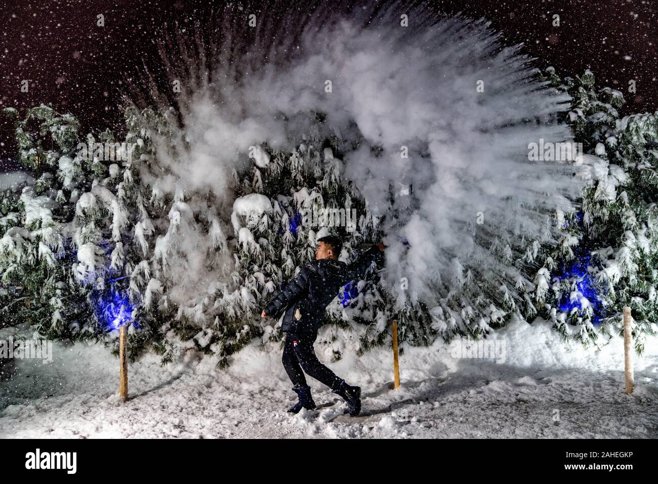 A person throwing hot water into the subzero cold air in Harbin, China ...