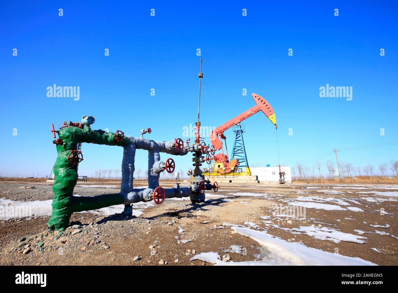 Oil fields, pumping units work Stock Photo - Alamy