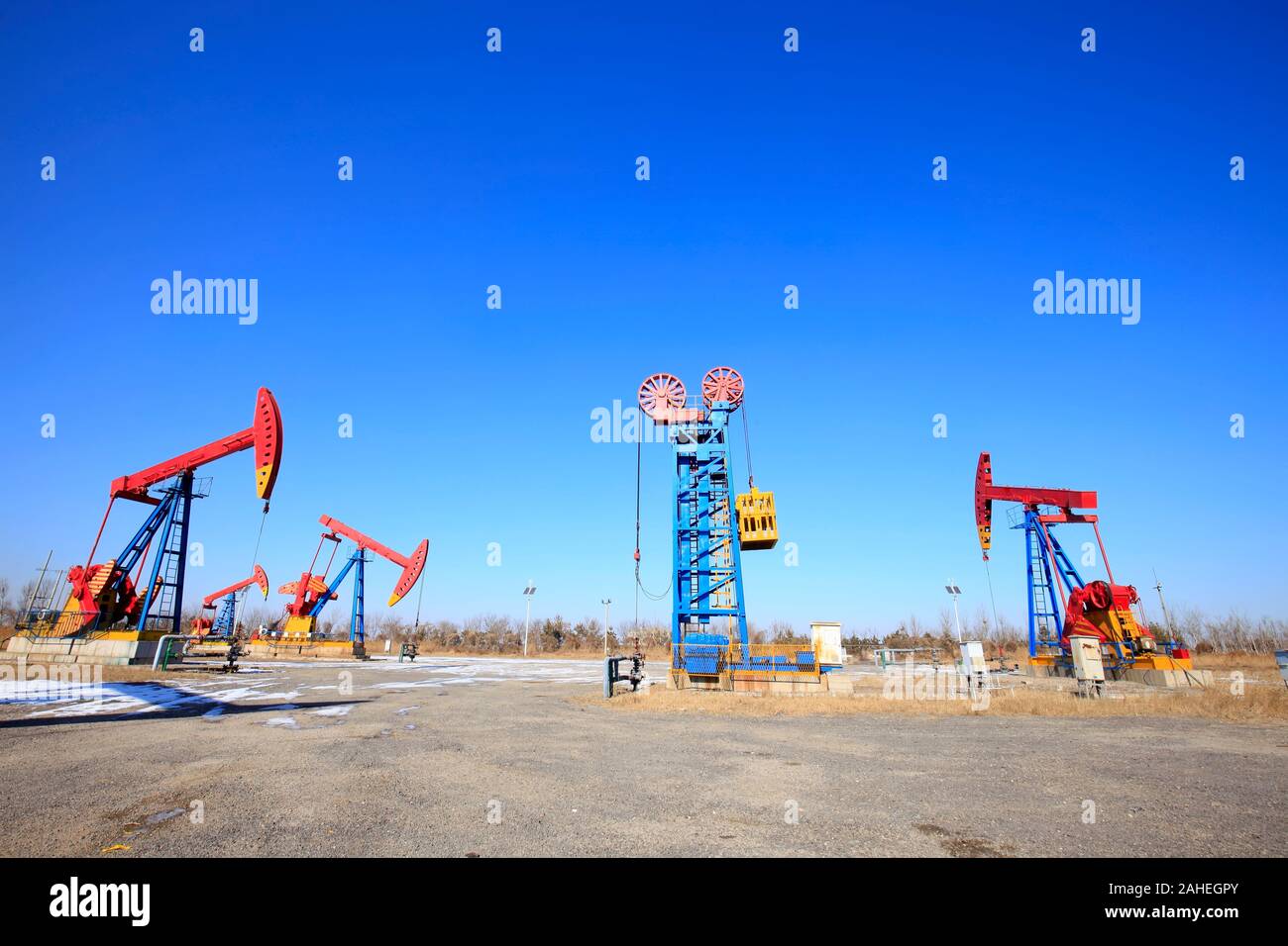 Oil fields, pumping units work Stock Photo - Alamy