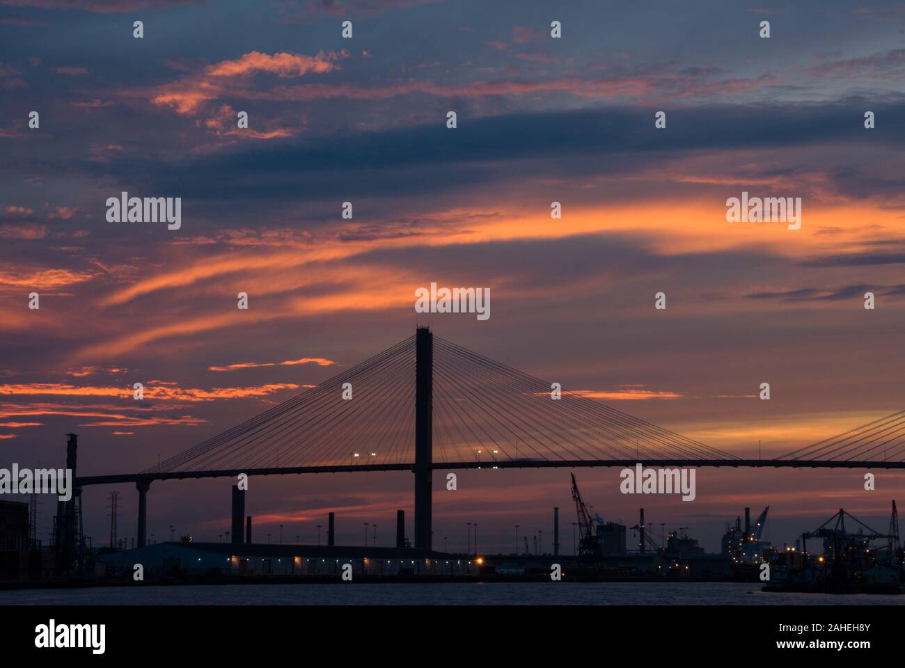 Sunset and a Suspension Bridge at the Port of Savannah, Georgia Stock ...