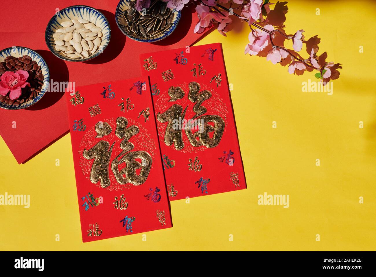Red traditional greeting cards wishing good luck on table served for ...