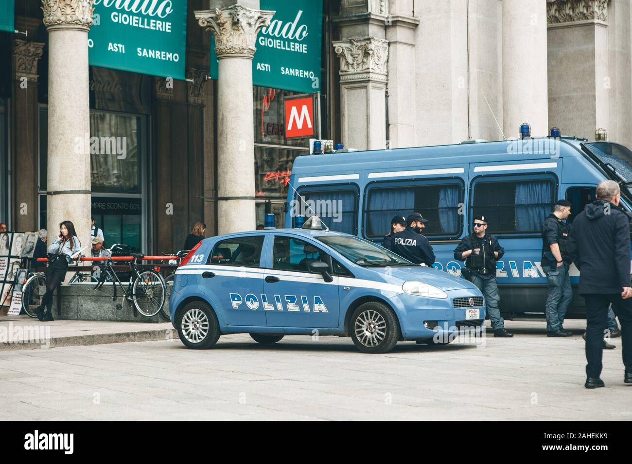 Italy, Milan, May 30, 2019: Police officers next to a police car on a ...