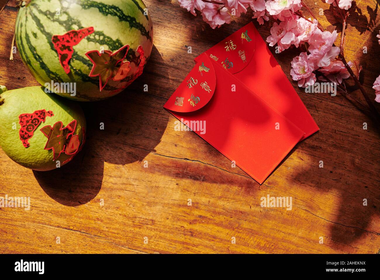 Fruits with best wishes stickers and red lucky money envelopes for ...