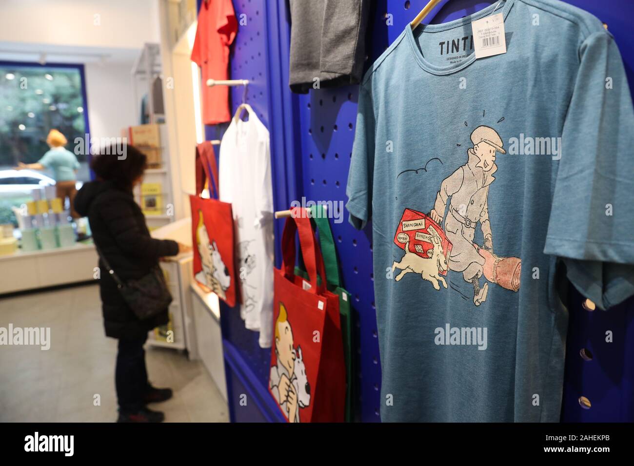 Shanghai. 26th Feb, 2019. A customer chooses Tintin products at a ...