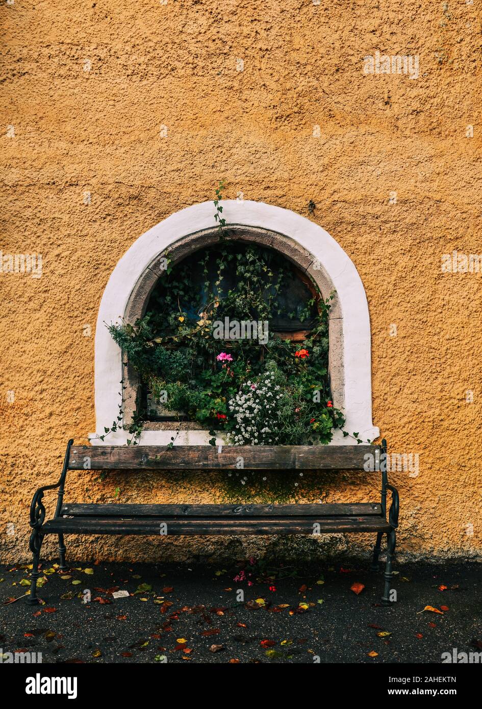 Vintage bench at ancient town in Hallstatt, Austria. Hallstatt is a ...