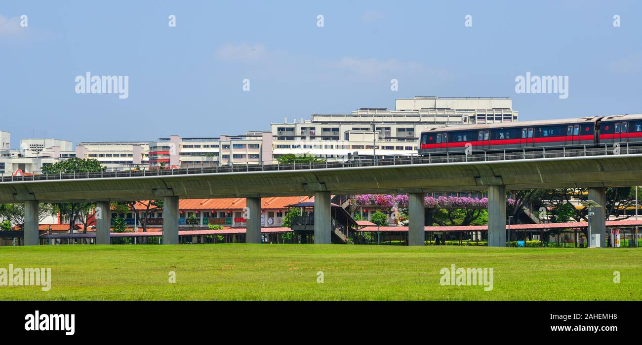 Singapore - Feb 9, 2018. Singapore MRT railway train pass though ...