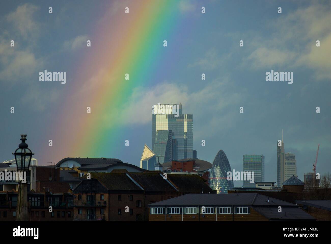Rainbow (enhanced) over City of London Stock Photo - Alamy