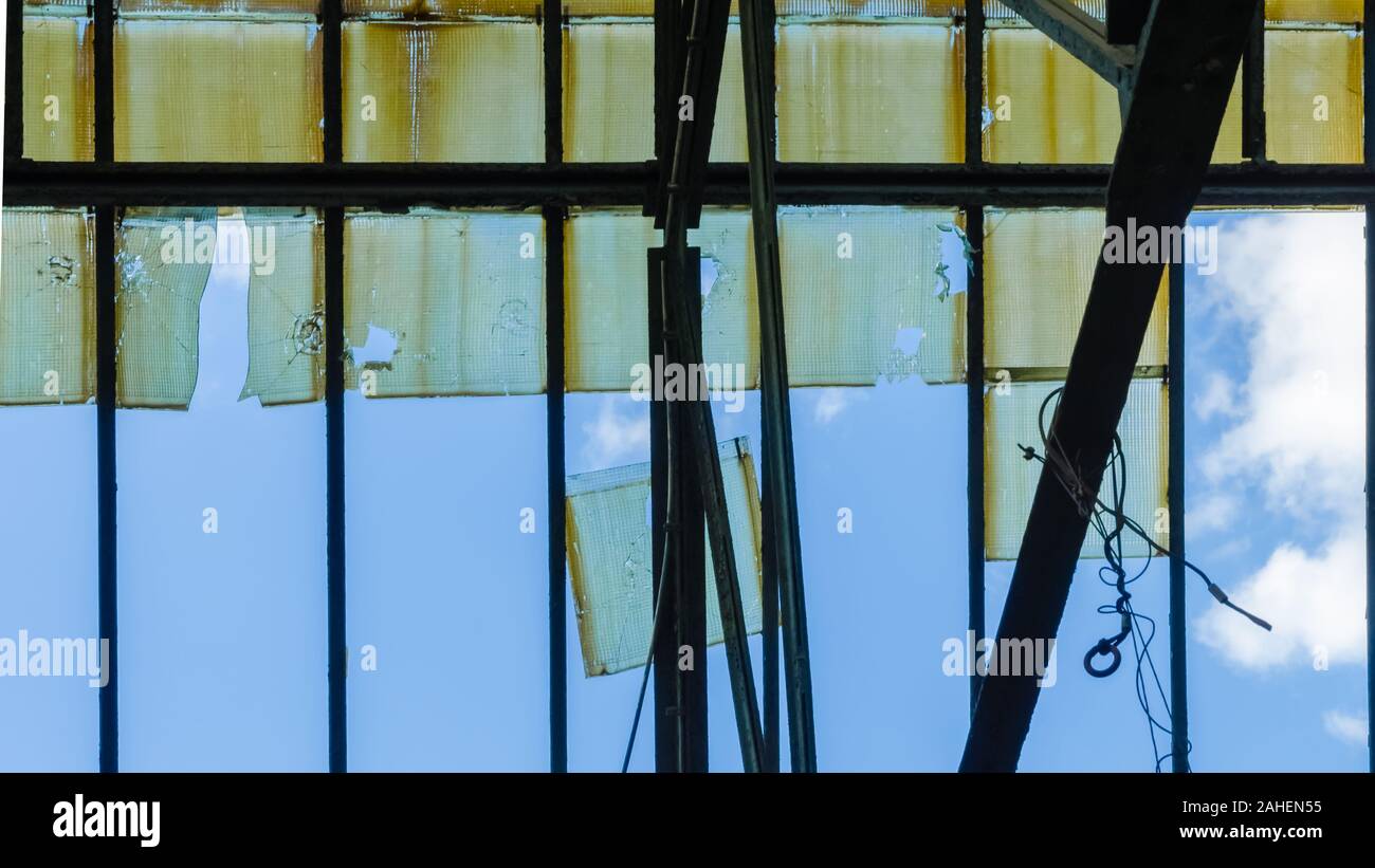 Broken window in a lost place hi-res stock photography and images - Alamy