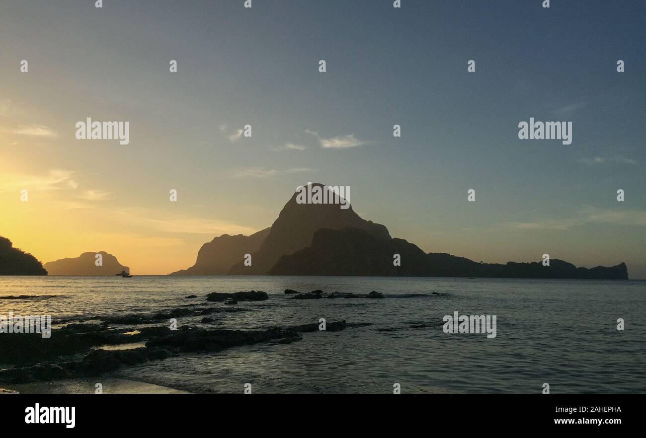 Sunset on the sea in Coron Island, Philippines. Coron is one of the ...