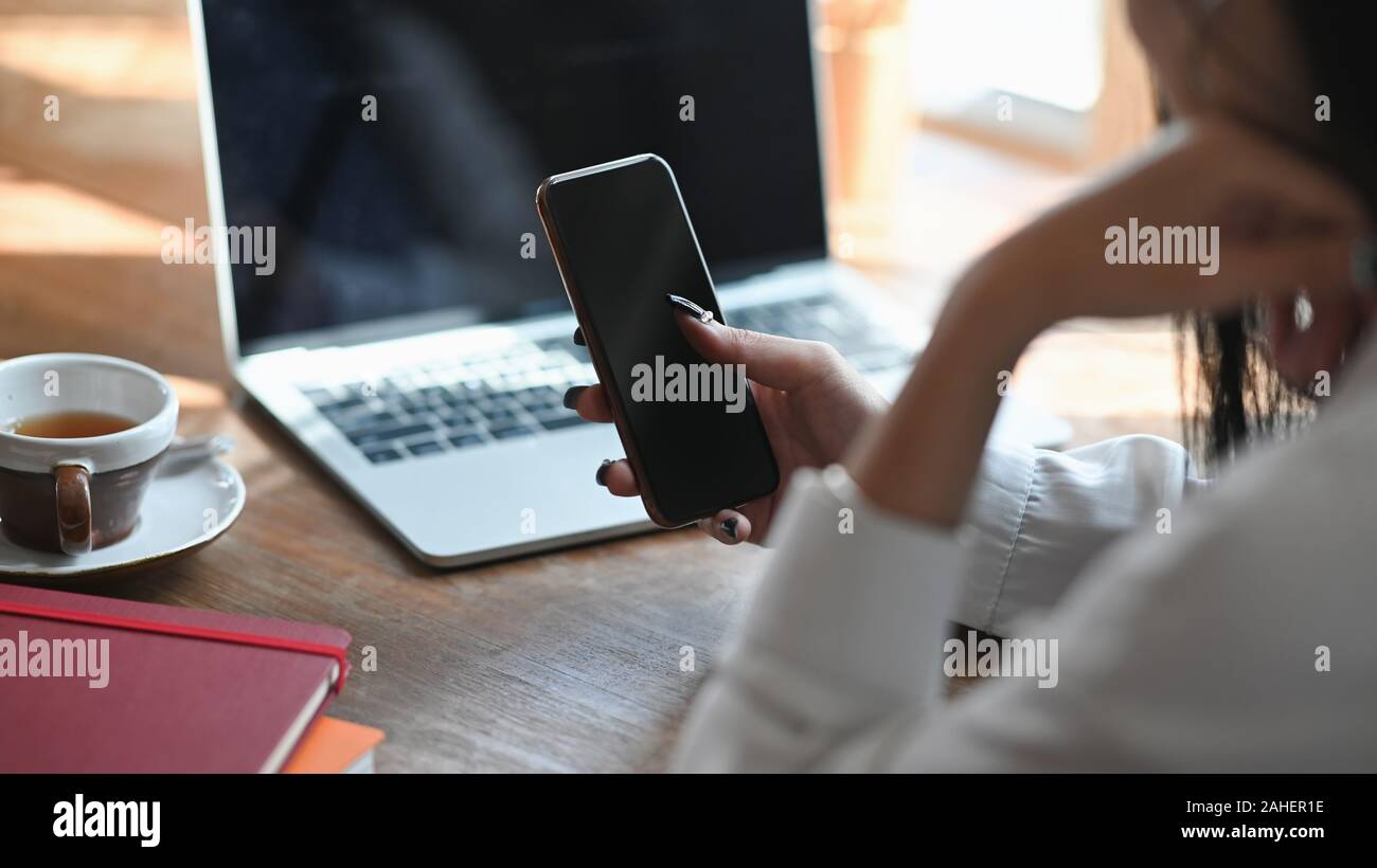 Cropped shot female using hi-res stock photography and images - Alamy