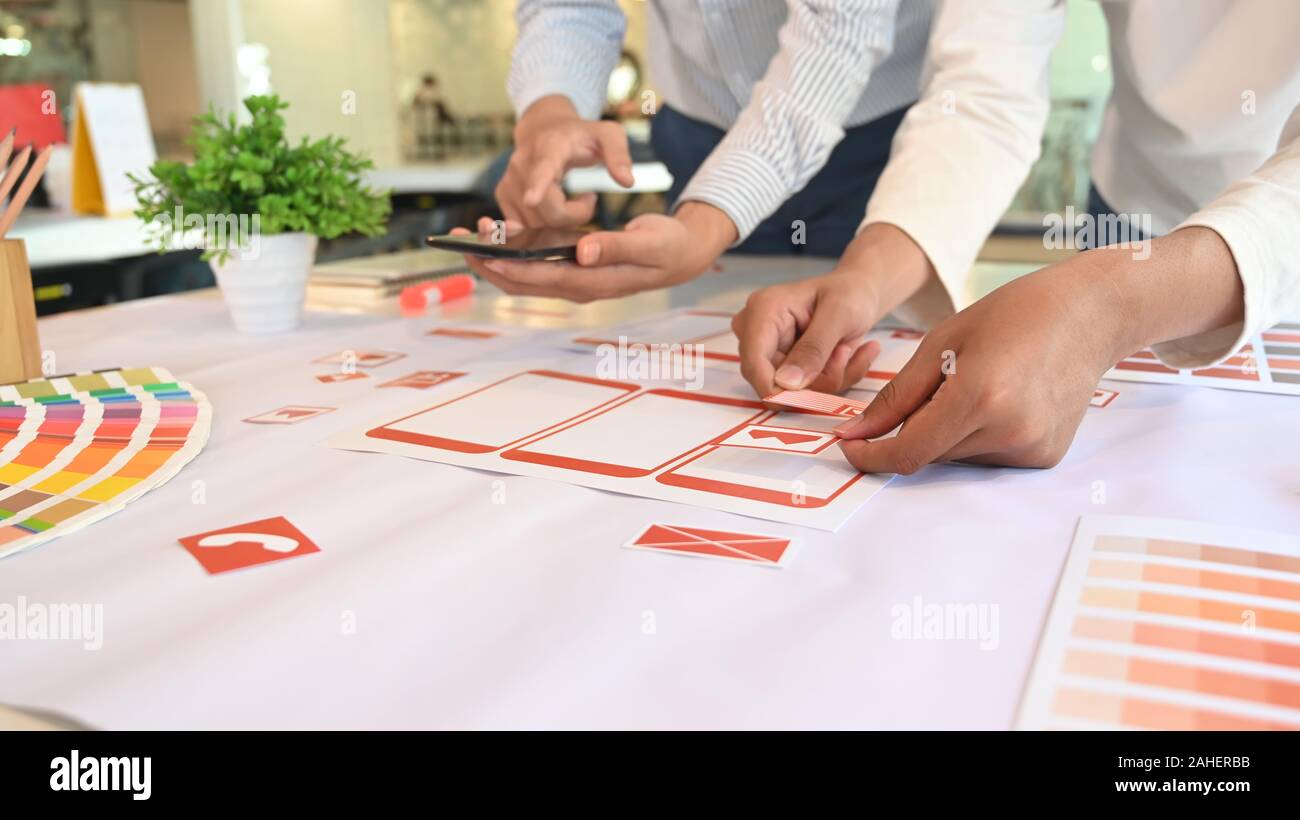 UX UI design with working team of development mobile application Stock ...