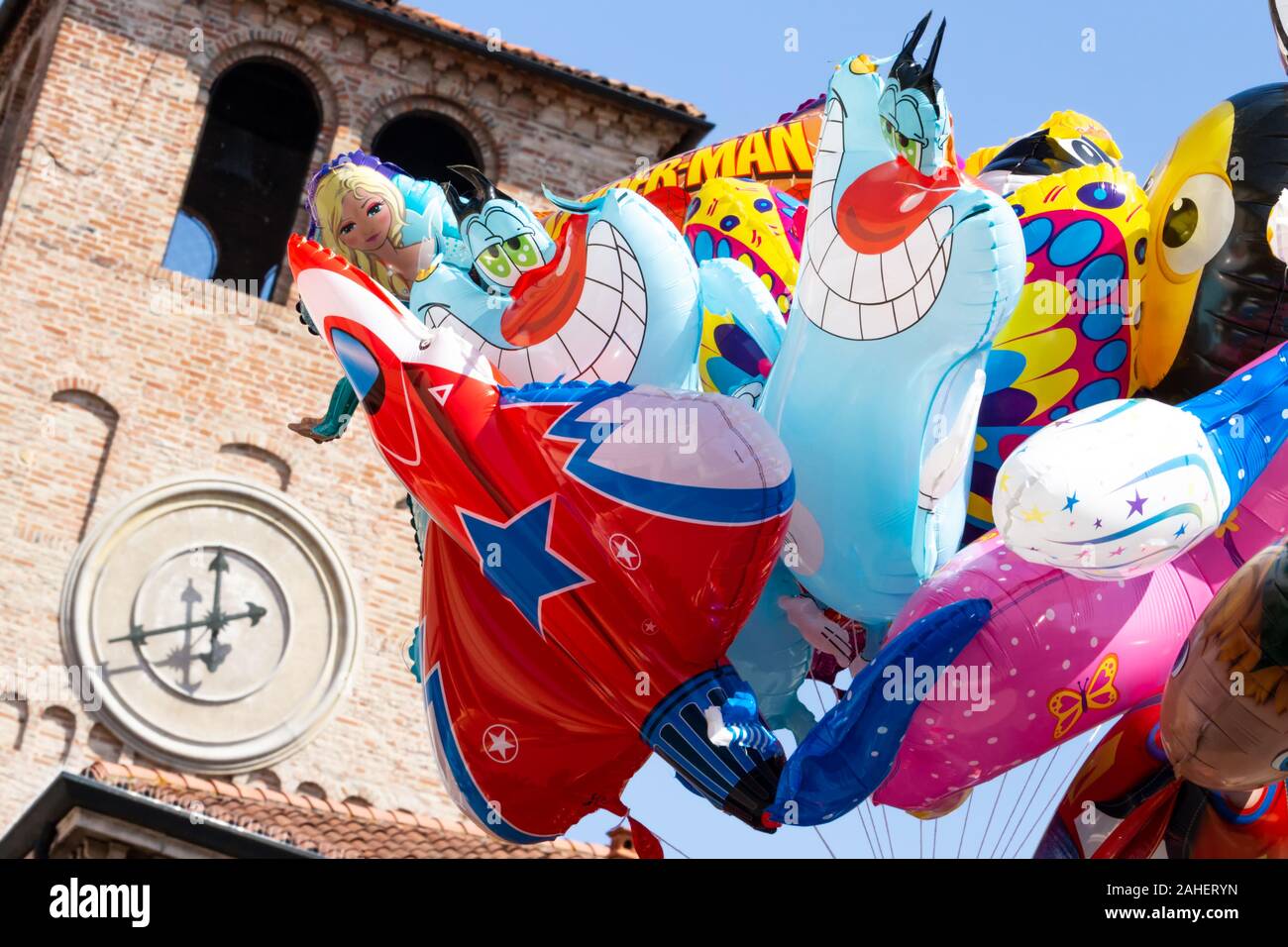 helium inflated colored balloons depicting various famous cartoons ...