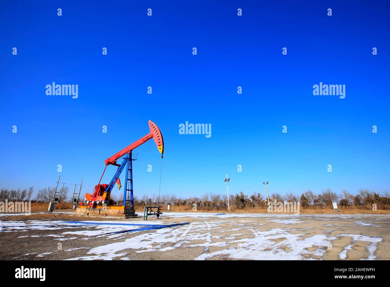 Oil field, oil pump in the work Stock Photo - Alamy