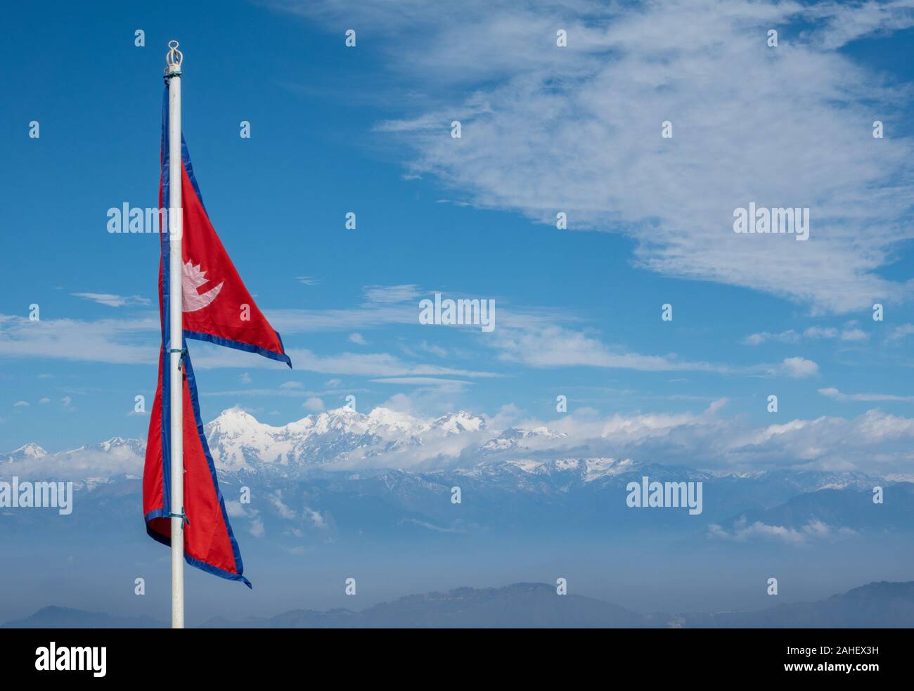 The triangular Nepal flag with the Himalaya Mountain Range in the ...