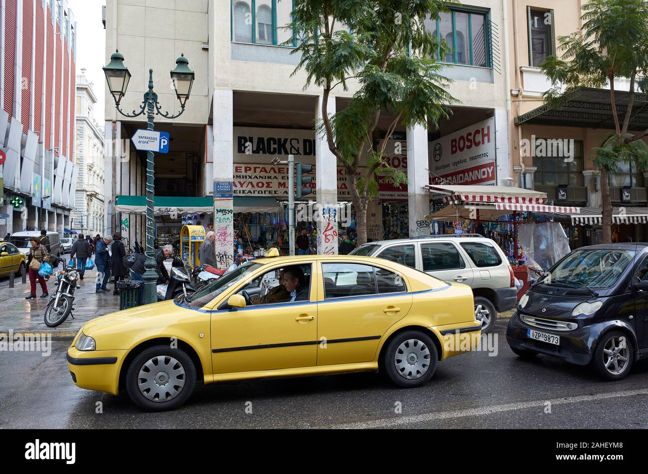 Athens taxi on trafic Stock Photo - Alamy
