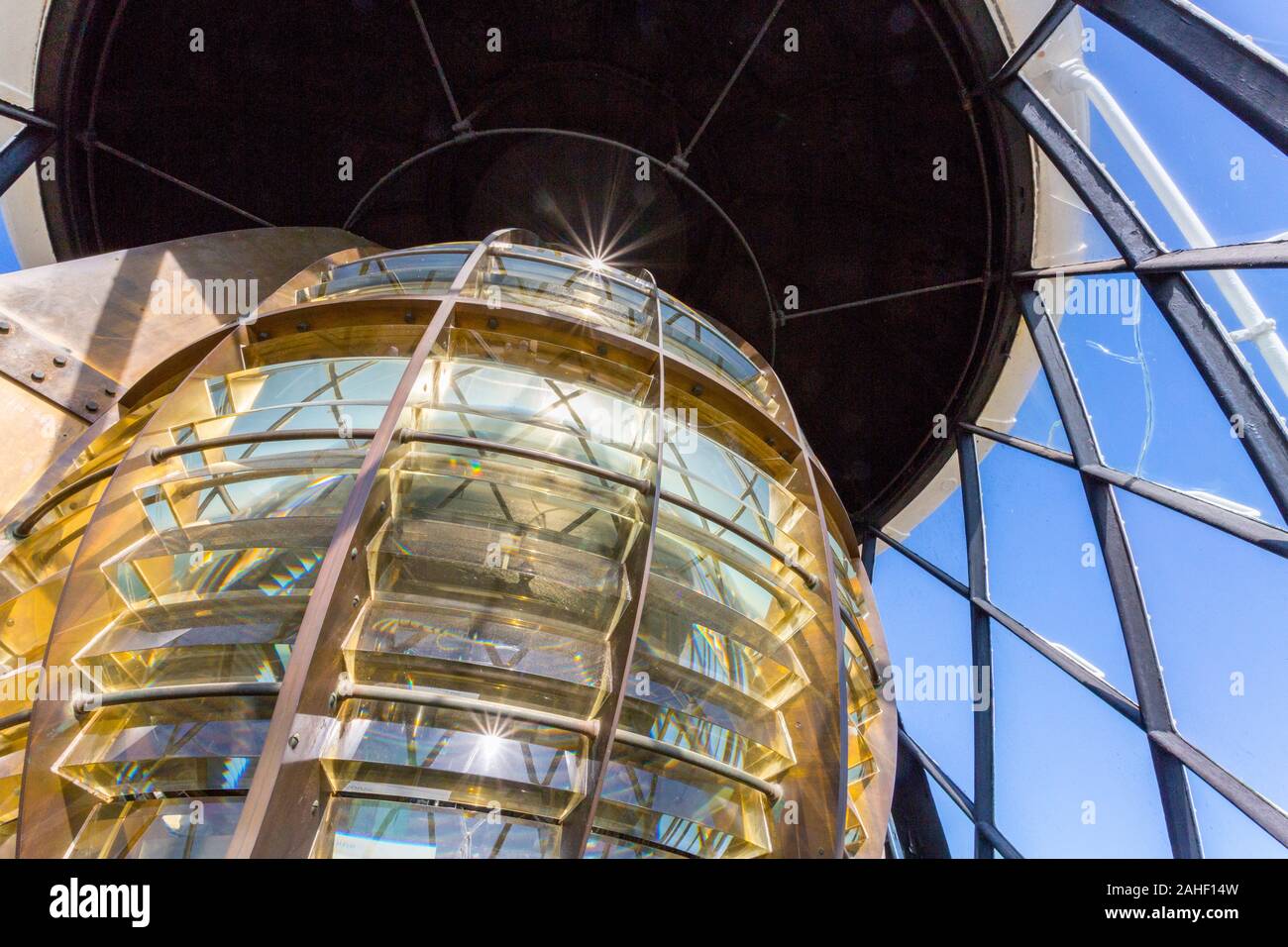 The glass prisms of the lens in the lantern room at Portland Bill ...