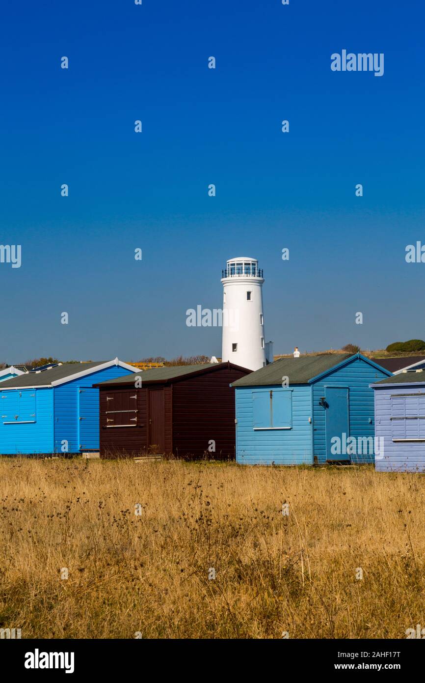 Colourful wooden sheds used as 'beach huts' and the former low ...