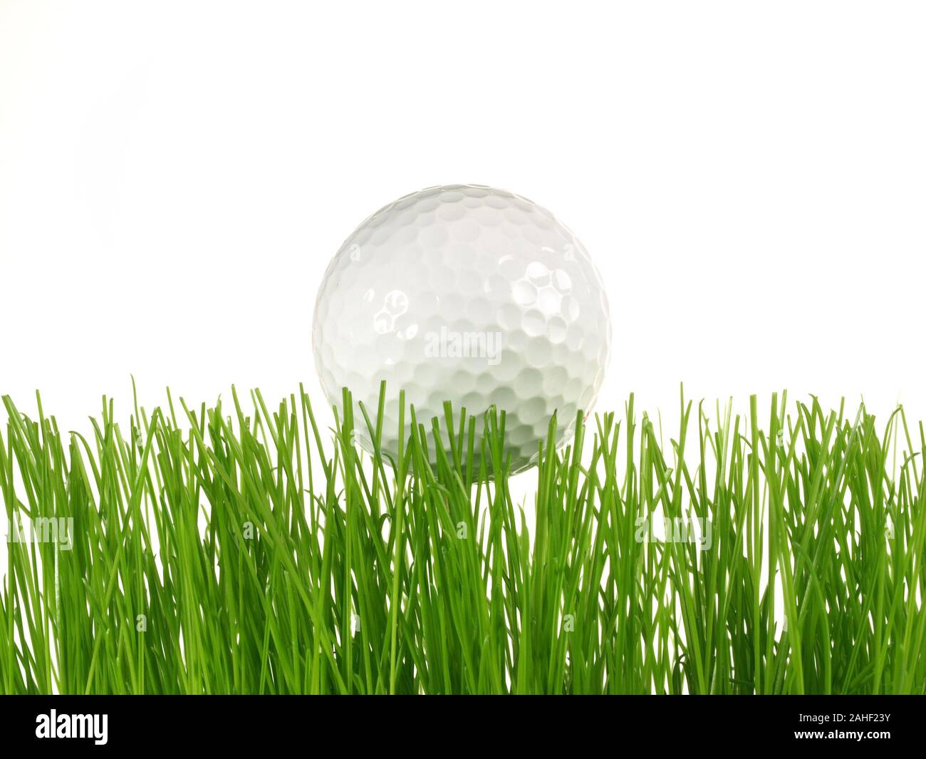 Ball in grass hi-res stock photography and images - Alamy