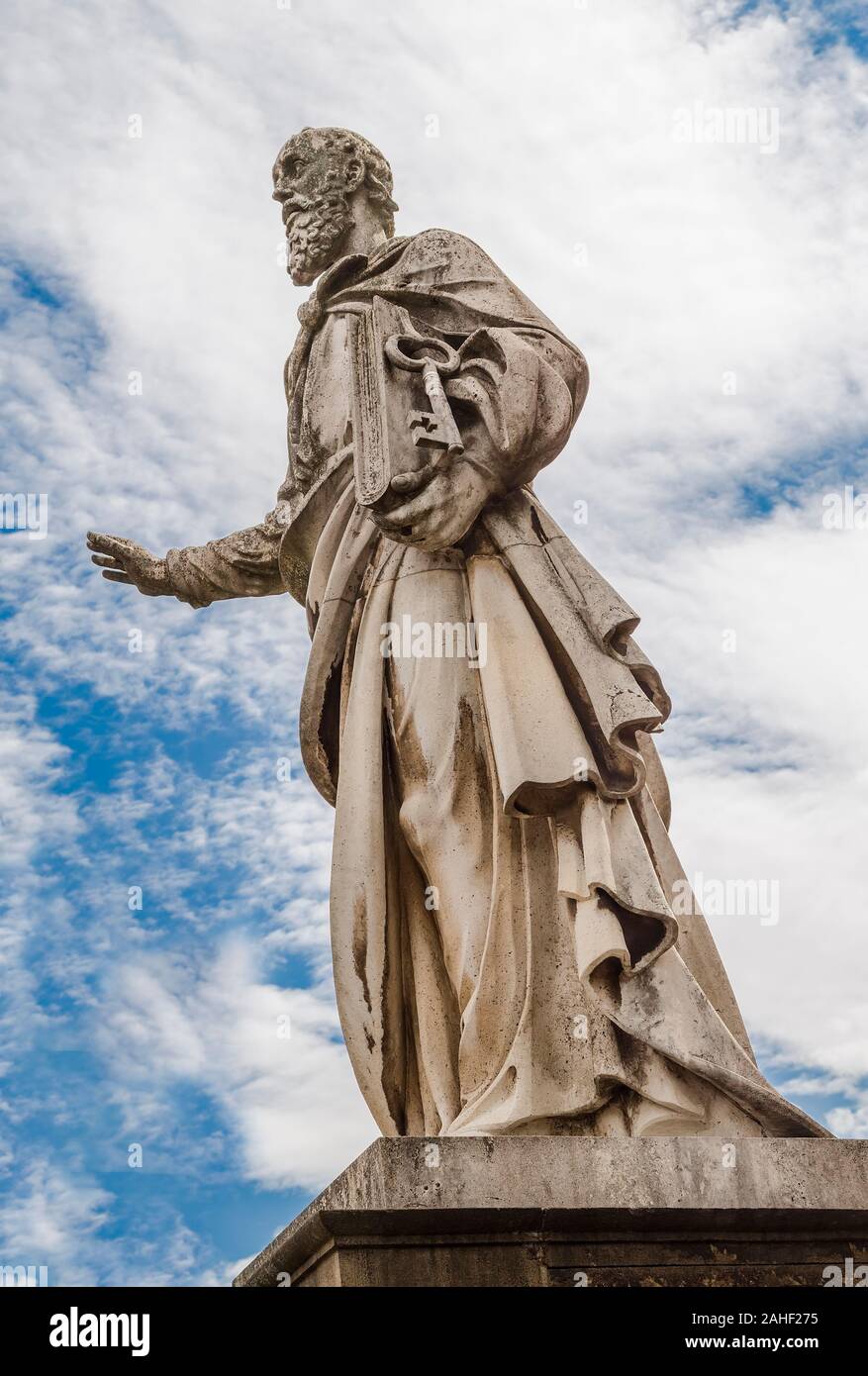 The sculpture of the Apostle Peter in front of the Basilica of St. John ...