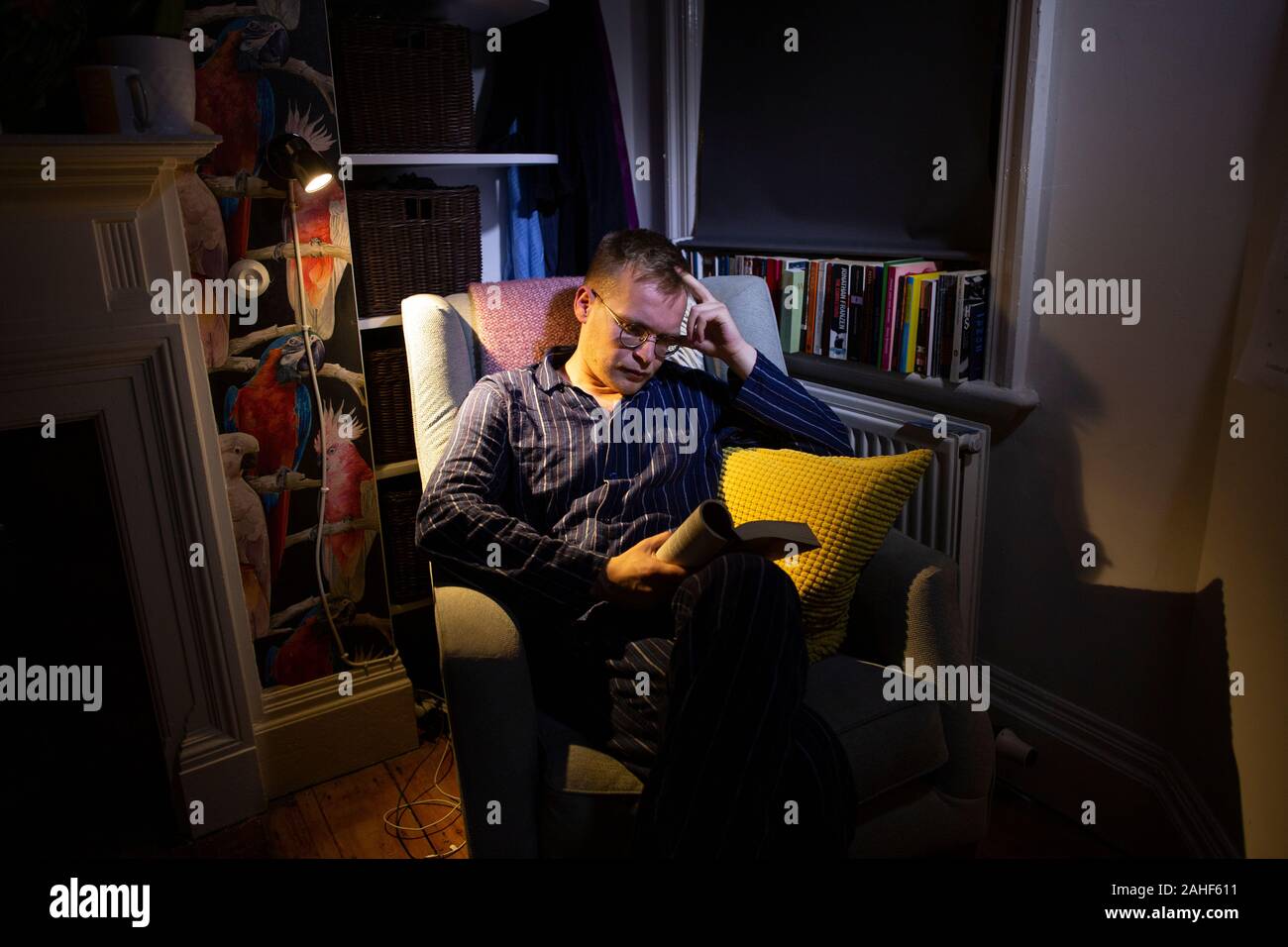 Man in his thirties engaging in 'segmented sleep'. Waking up for an ...