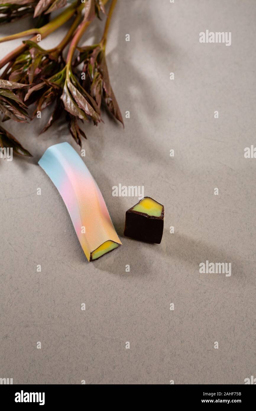 Color candy bar on gray background Stock Photo - Alamy