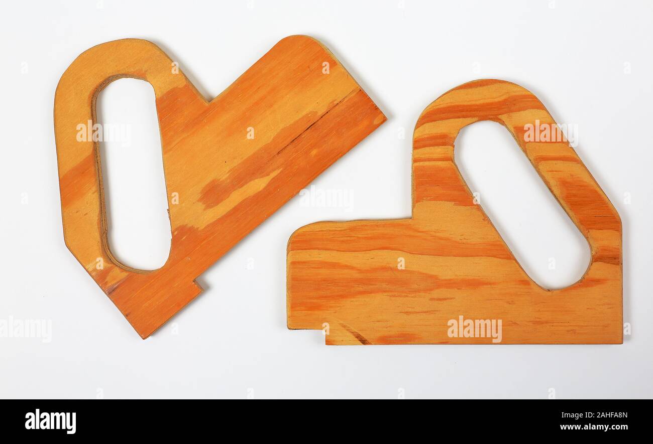 Plywood push sticks isolated on a white surface Stock Photo - Alamy