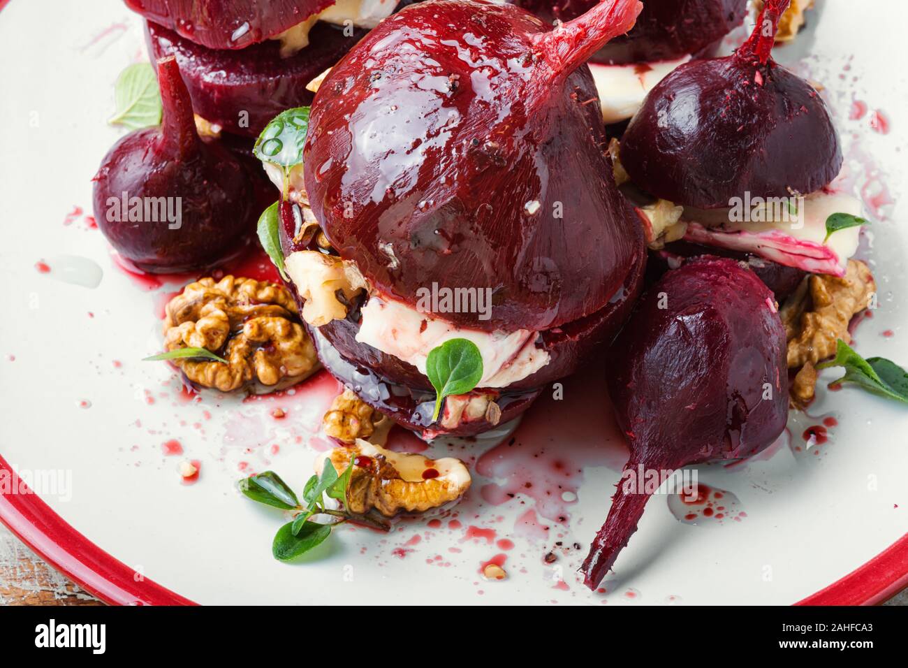 Boiled beetroot with soft cheese and walnut Stock Photo - Alamy