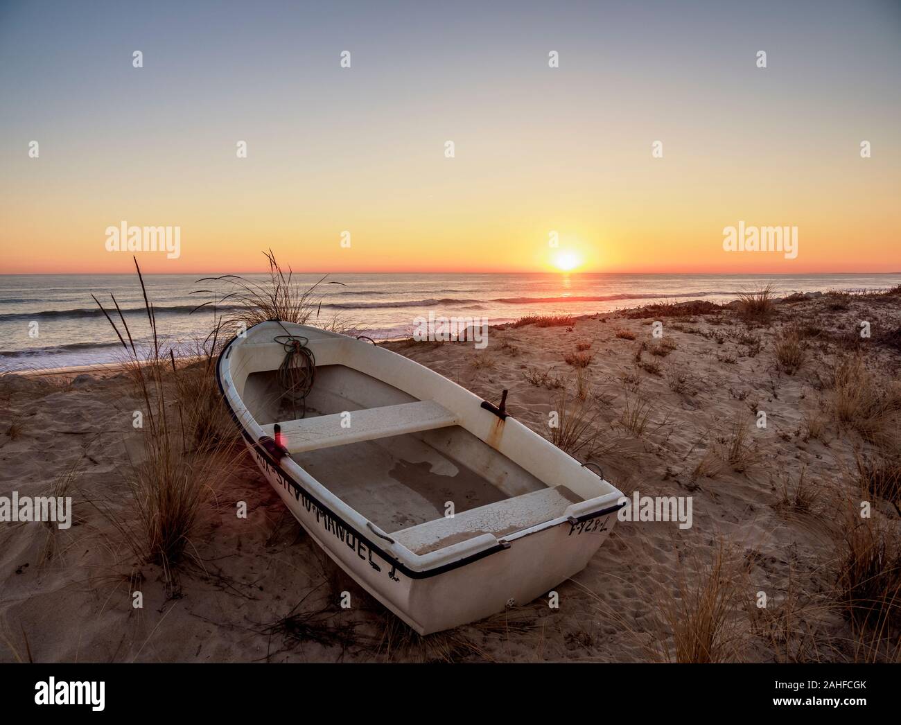 Faro Beach at sunset, Ilha de Faro, Ria Formosa Natural Park, Faro ...