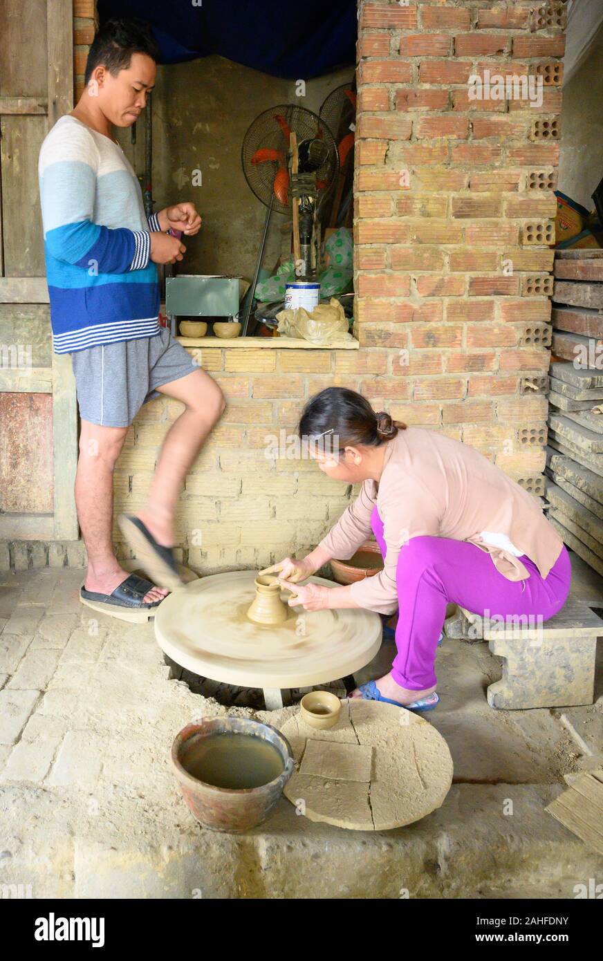 Making traditional pottery using a foot powered wheel Stock Photo - Alamy